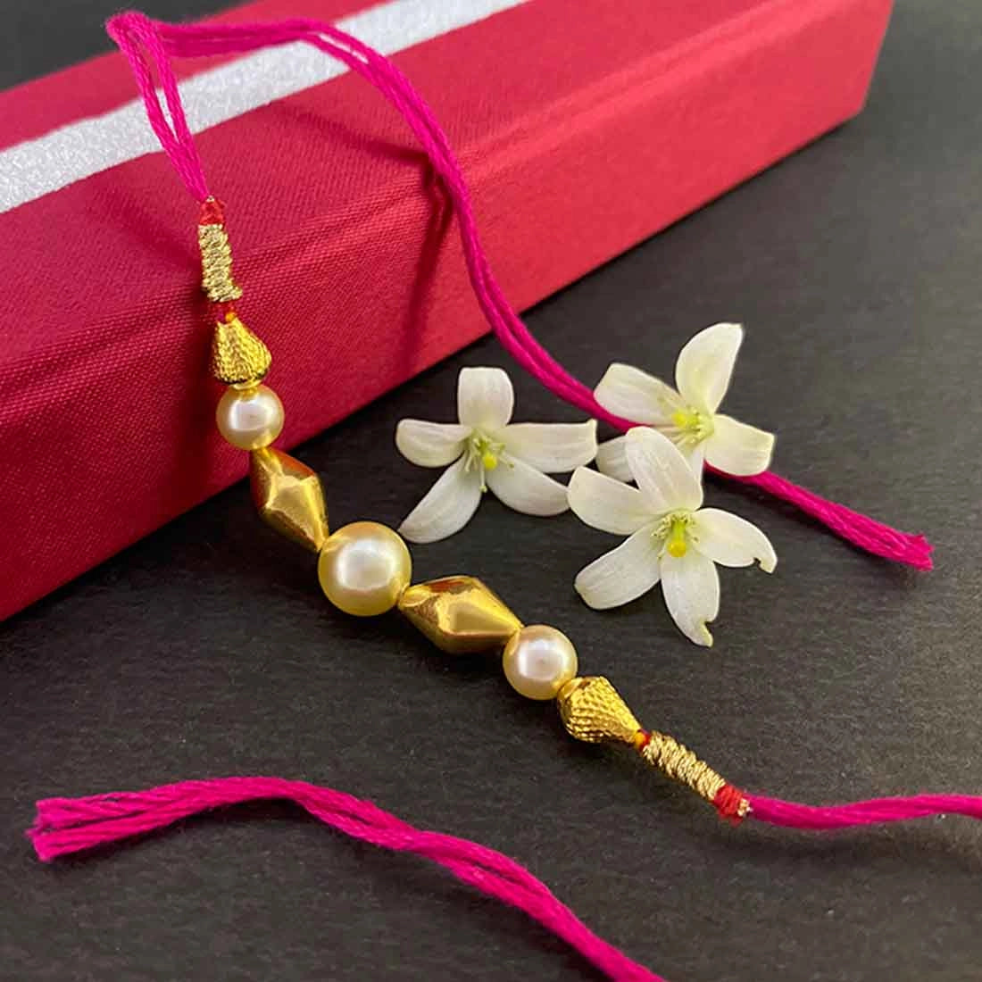 P.C. Chandra Jewellers 22KT Yellow Gold & Plastic Pearl Rakhi for Men ...